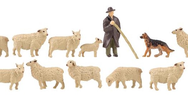 Model Railway Shepherd with sheep dog and sheep in OO