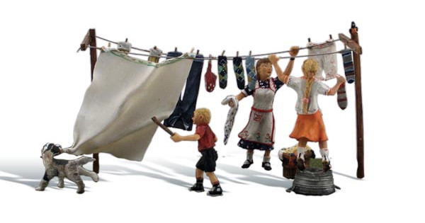 women-hanging-washing-oo